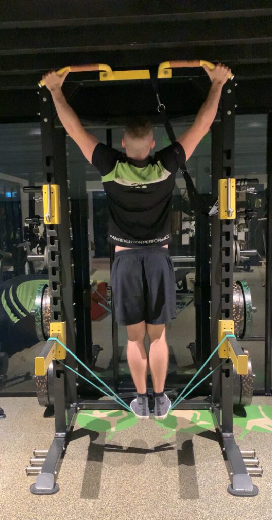 How to maintain shoulder mobility health with Dead Hangs – Peak Sport ...